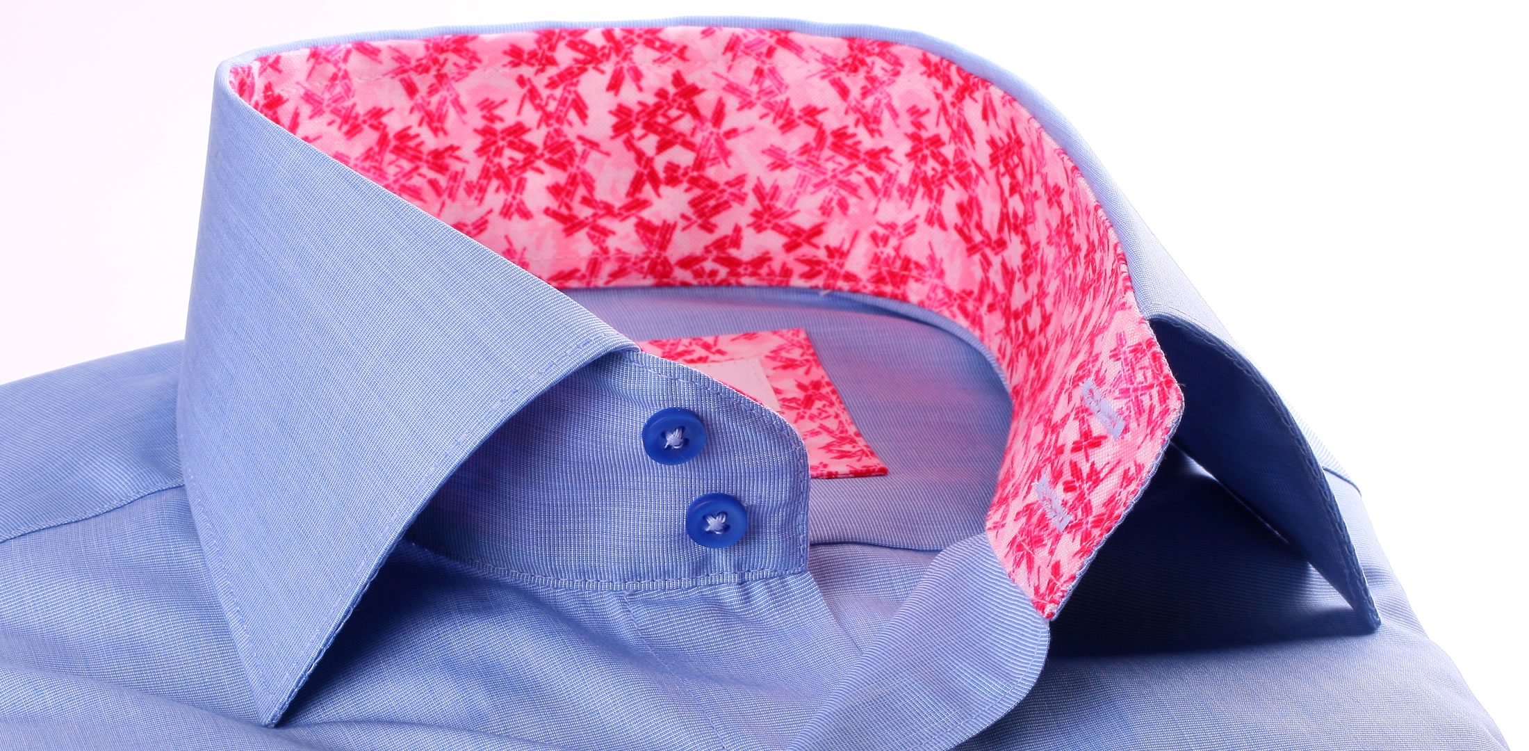 Blue shirt with pink pattern collar and cuffs