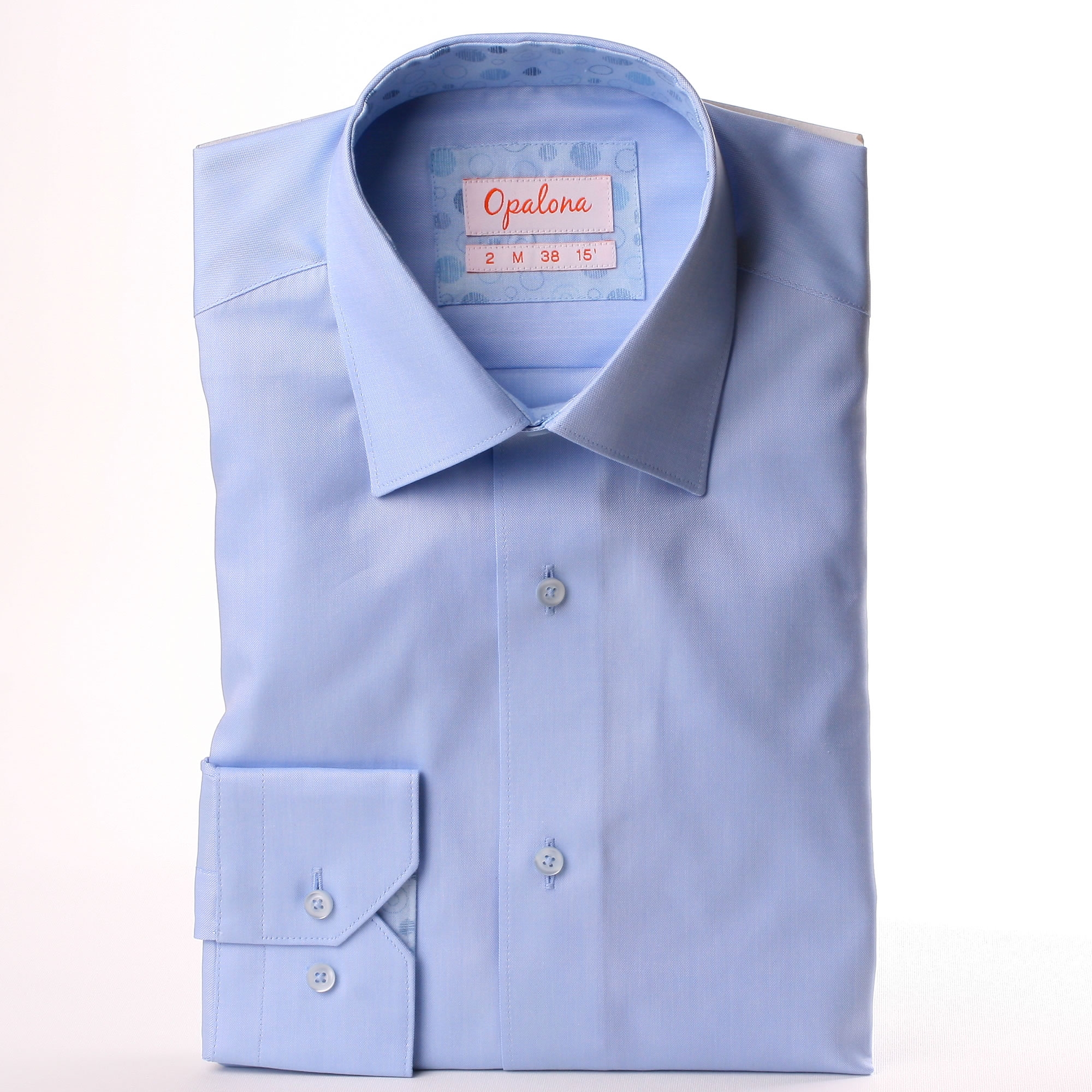 Light blue shirt with blue circular pattern collar and cuffs